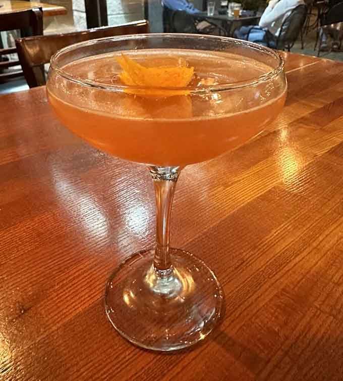 That citrus twist signals you're about to experience a Sidecar that'll make you forget every mediocre version.