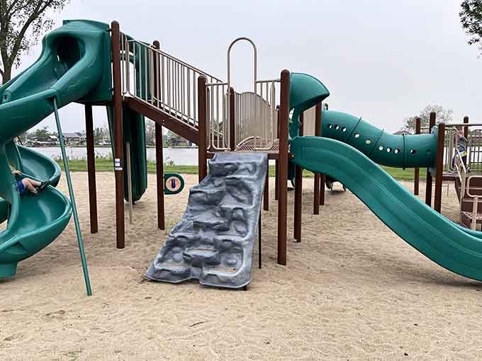 The playground keeps kids entertained while parents enjoy that rarest of commodities: a moment of peace by the water.