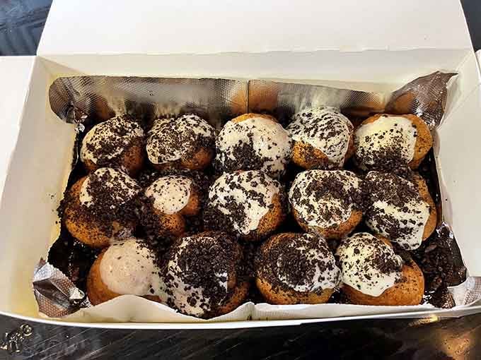 Cookies and cream mini donuts dusted with cookie crumbles look like tiny edible snowballs of joy.
