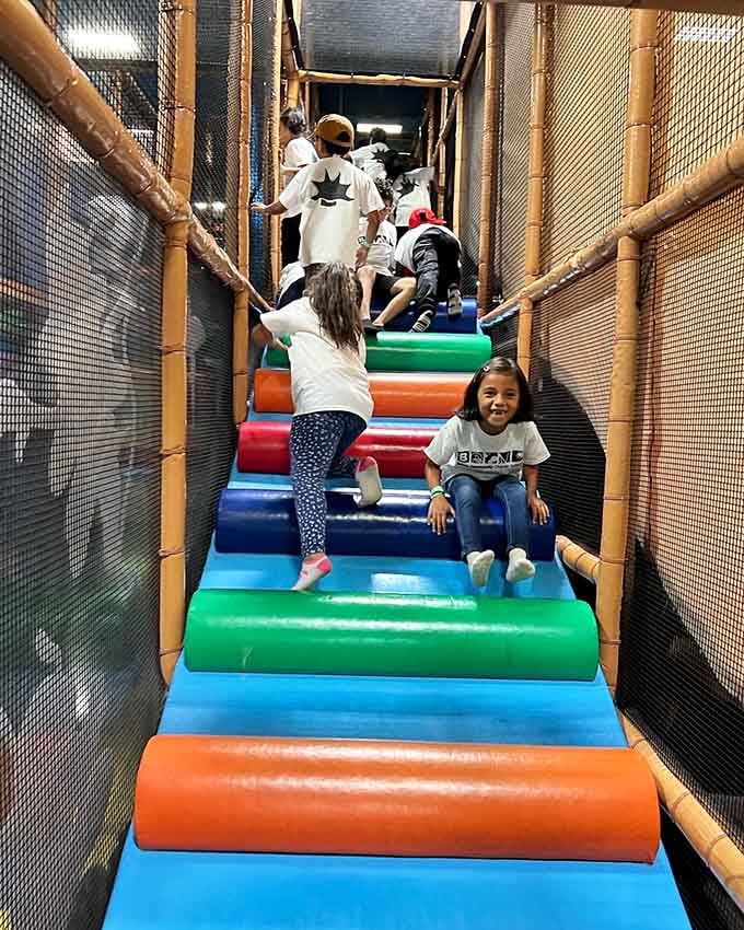 Watch kids navigate this rainbow obstacle course like tiny American Ninjas in training, minus the dramatic background music.