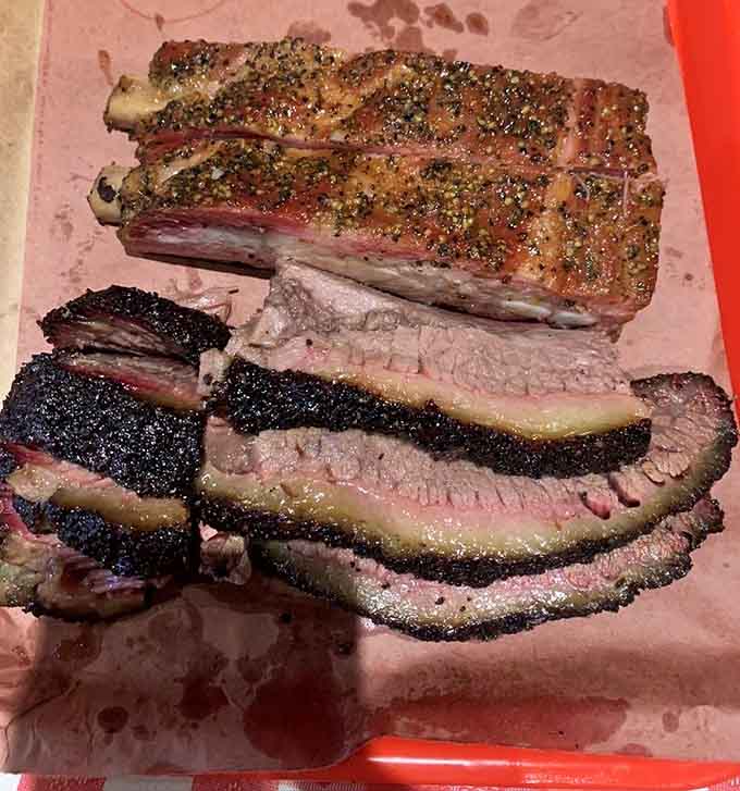 That smoke ring and bark on this brisket could make a grown person weep tears of pure joy.