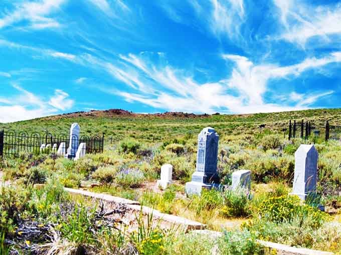 The cemetery tells stories that history books forgot, each headstone a window into lives lived at the edge.