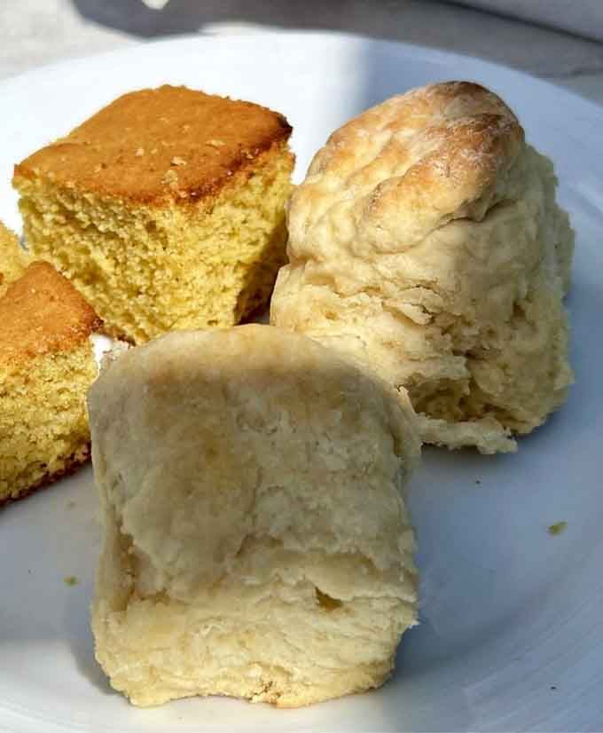 Fluffy biscuits and golden cornbread proving that carbs aren't the enemy, they're actually your very best friends.