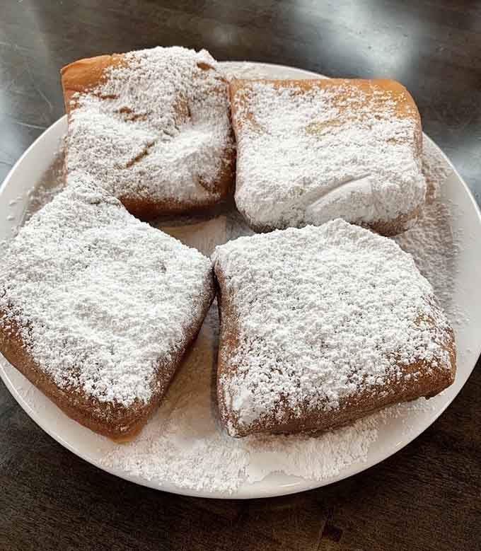Beignets so generously dusted with powdered sugar, you'll look like you walked through a snowstorm by the end.
