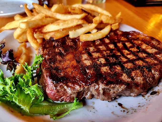 Perfectly grilled steak with those beautiful char marks that prove someone back there really cares about your dinner.