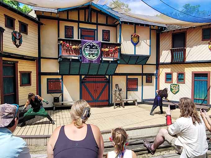 Sword fights unfold on wooden stages where the only special effects needed are skill, timing, and theatrical flair.