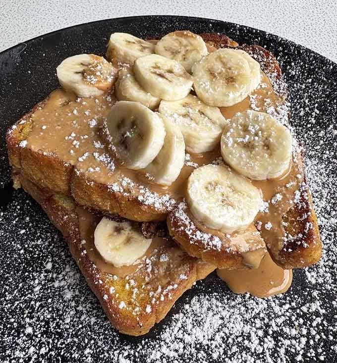 Elvis has left the building, but his French toast legacy lives on in banana-topped, peanut butter glory.