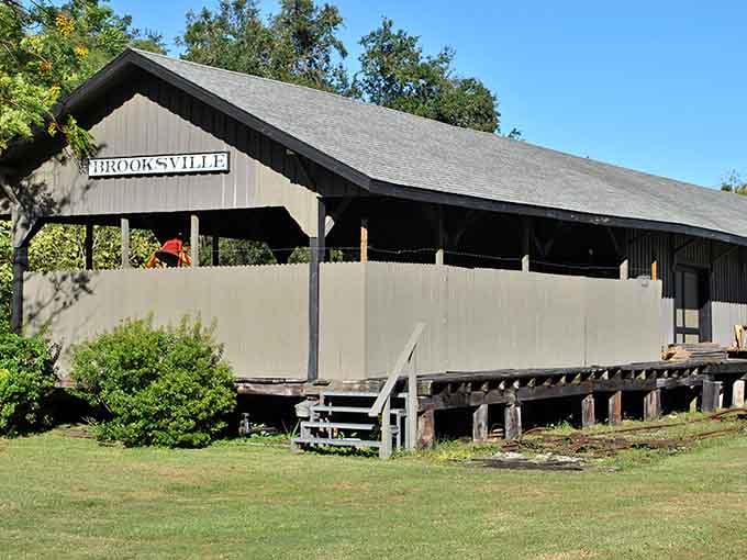 The 1885 train depot sits quietly now, a wooden reminder of when Brooksville was the place to be.