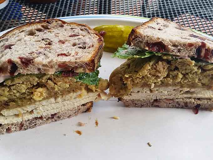 Cranberry-pecan bread holding together what looks like a perfectly seasoned turkey situation, because Cape Cod knows how to sandwich.