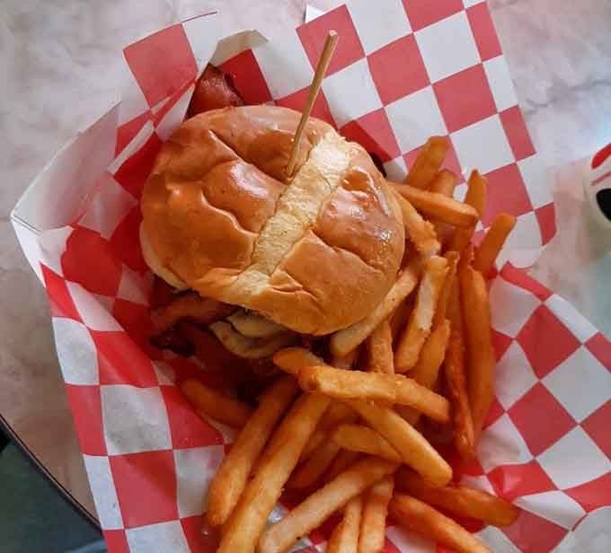 Sometimes the simplest pleasures are the best: a golden burger, crispy fries, and that satisfying red checkered paper.