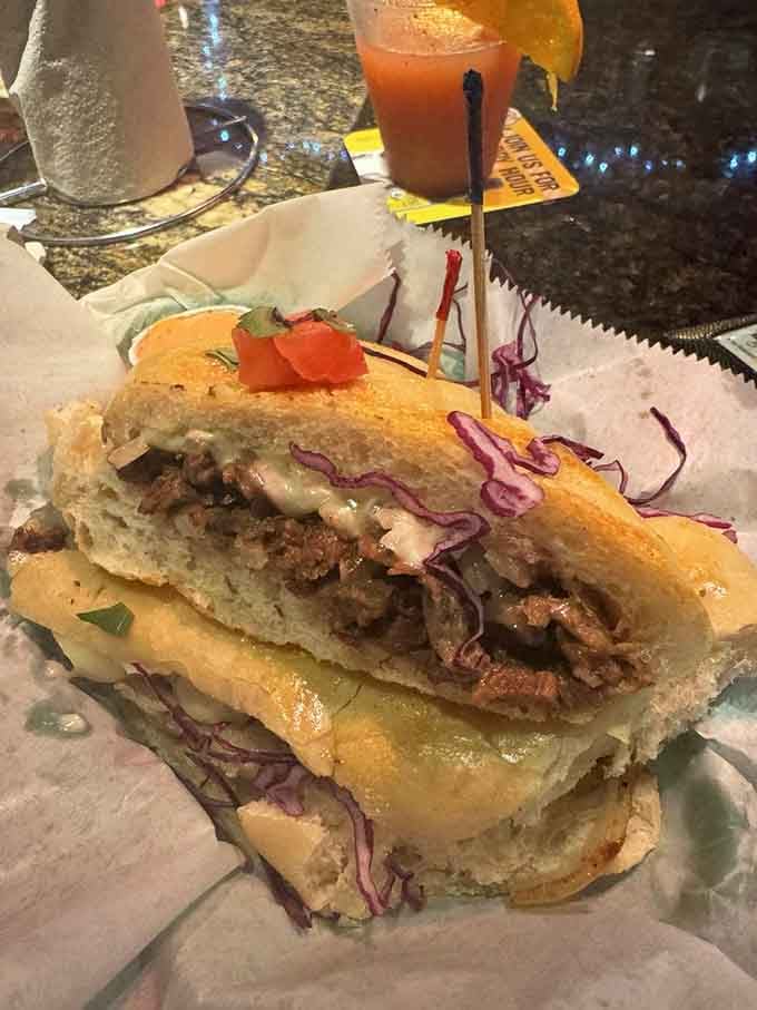 The steak Cubano arrives golden and pressed to crispy perfection, proving that sometimes simple ingredients create extraordinary magic.