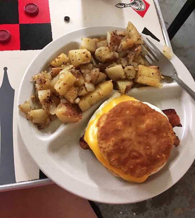 A perfectly golden breakfast sandwich with crispy home fries proves that simple done right beats fancy done wrong every single time.