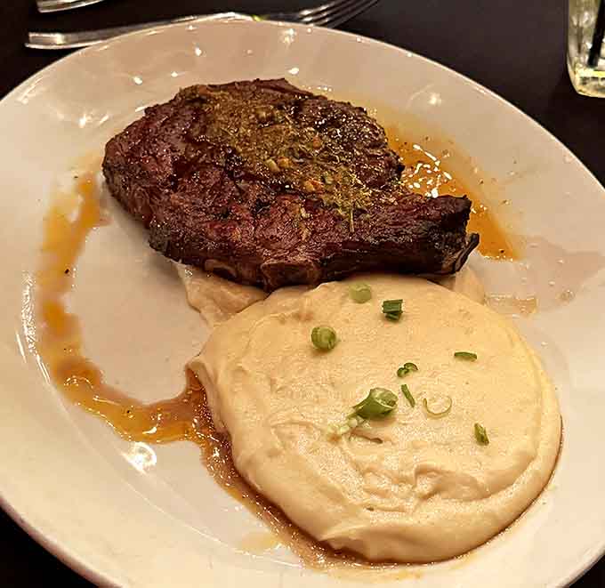 That steak sits on creamy perfection like it just won the lottery and knows it, completely unbothered by your diet plans.
