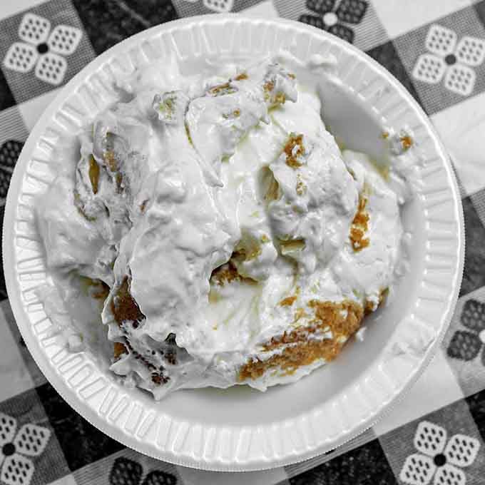 Clouds of whipped cream top what appears to be pure happiness in dessert form on your plate.