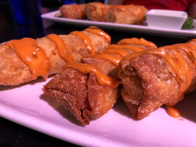 Cheeseburger eggrolls drizzled with sauce: because sometimes fusion food actually makes perfect sense in this beautiful world.