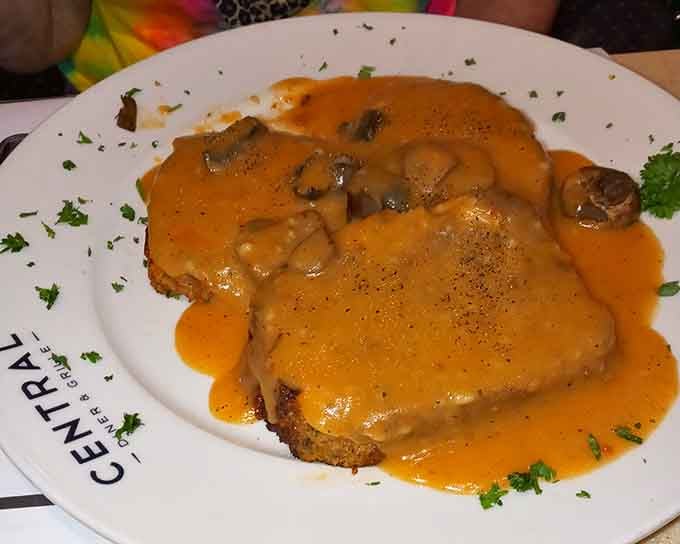 That meatloaf with mushroom gravy looks like comfort food achieved its final form and decided to pose for pictures.