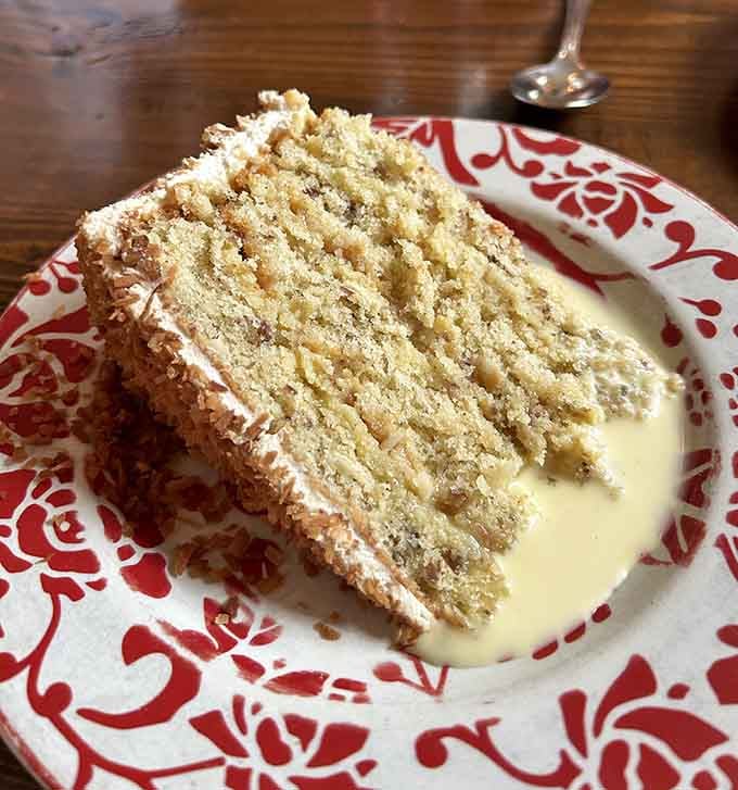 Multiple layers of pure coconut heaven that'll make you understand why people plan entire trips around this cake.