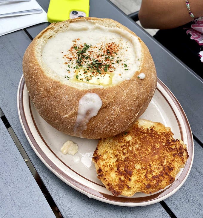 Clam chowder served in a bread bowl is basically edible architecture at its finest.