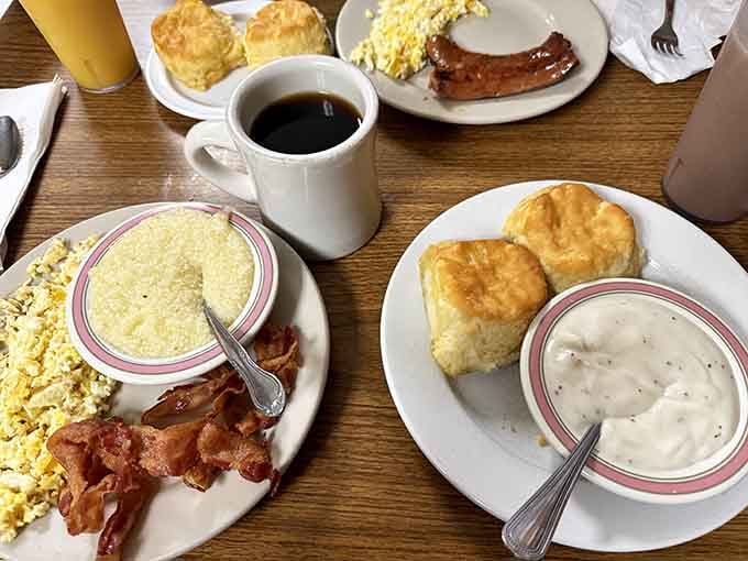 Fluffy biscuits drowning in sausage gravy next to perfectly cooked bacon&mdash;this is what breakfast dreams are made of.