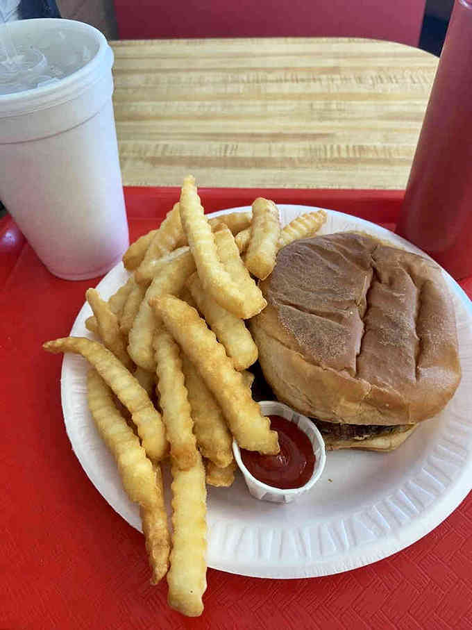 When your burger arrives looking this perfect, you almost feel guilty taking that first glorious bite.