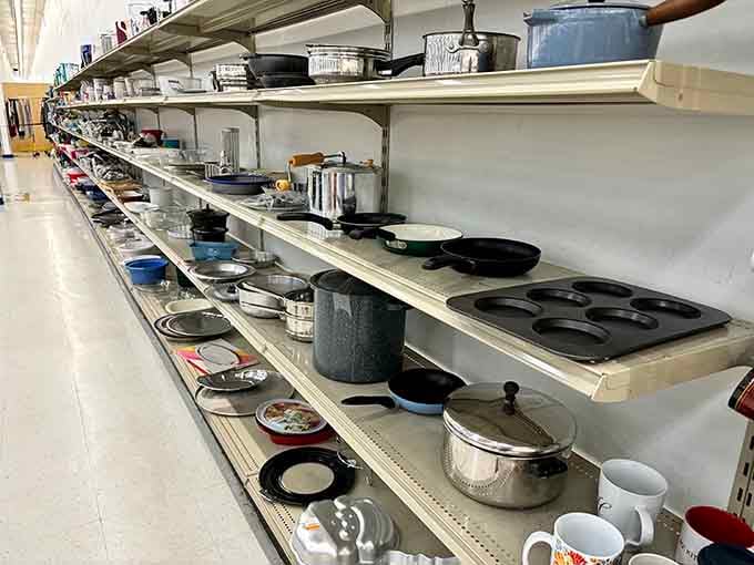 Pots, pans, and possibilities line these shelves like a culinary choose-your-own-adventure waiting to happen.