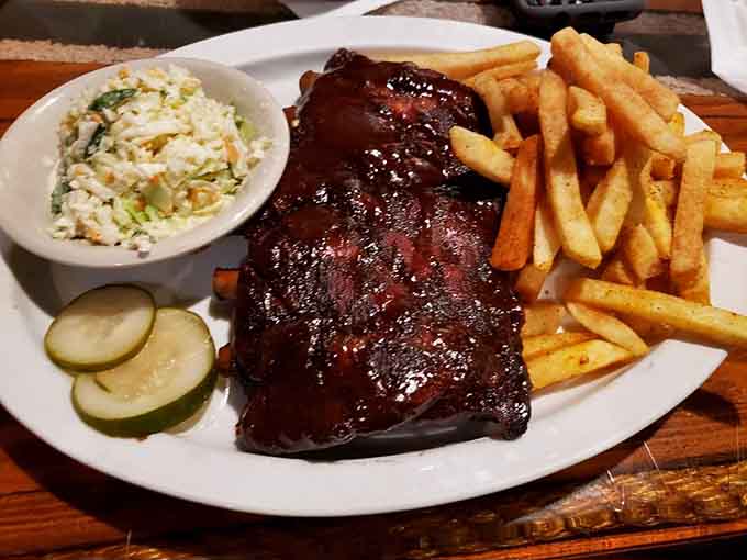 These ribs wear their barbecue sauce like a badge of honor, glistening with the kind of glaze that haunts your dreams.