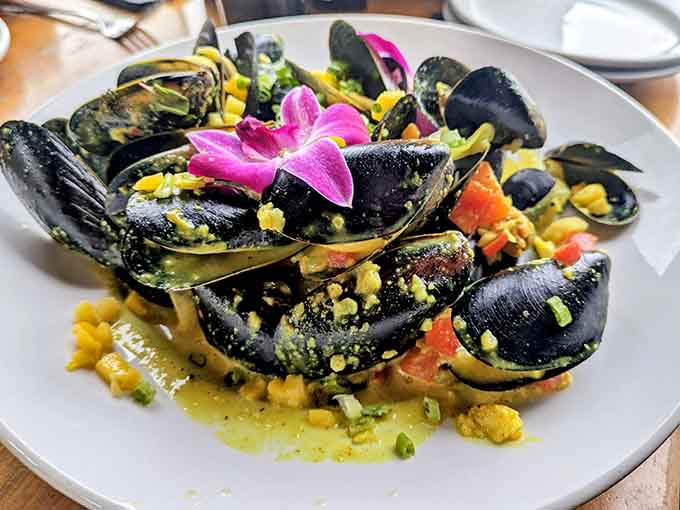 Front Street Grill's mussels arrive glistening in garlic butter, ready to make you forget every other meal you've ever had.