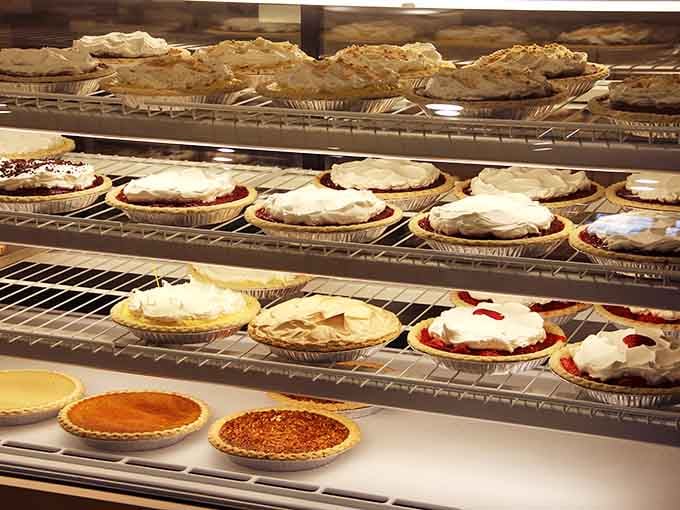 Rows of pies cooling on racks like edible soldiers ready to deploy happiness to your table.
