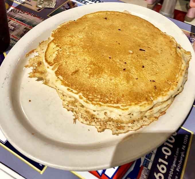Behold the pancake that launched a thousand return visits, golden and glorious in all its fluffy magnificence.