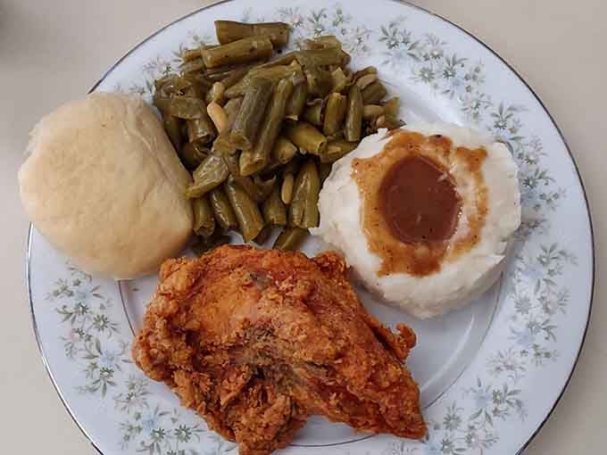 Golden, crispy, and glistening with promise, this is the fried chicken that'll haunt your dreams in the best way.