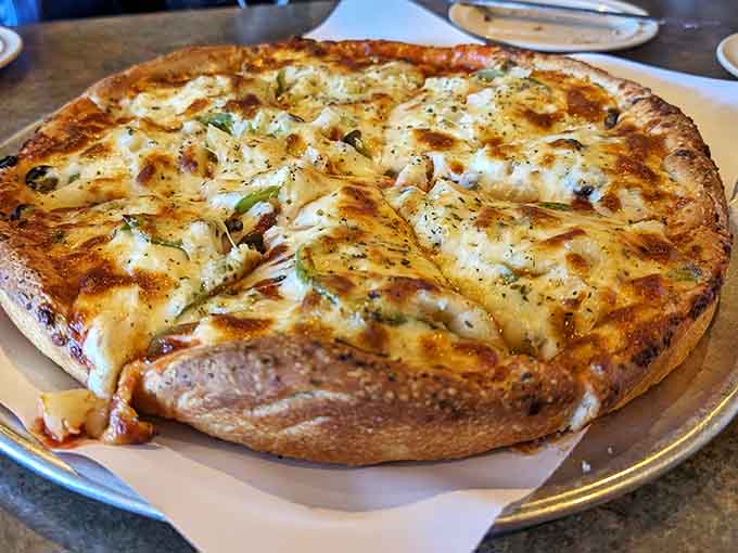 Behold the golden-crusted tower of cheese and toppings that puts Chicago on notice right here in Minnesota.