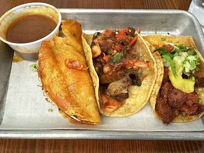 Pork belly with kimchi and tamarindo glaze proves fusion food can respect tradition while creating something entirely new and delicious.