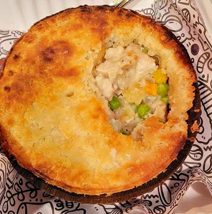 Chicken pot pie gets the handheld treatment, complete with peas, carrots, and that golden crust you want to marry.