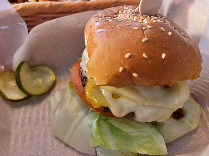 Sesame seed bun, melted cheese, and pickles on the side &ndash; simplicity executed so well it becomes poetry.