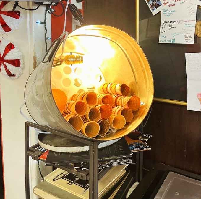 Fresh-rolled waffle cones waiting under warm light, ready to cradle your ice cream dreams in crispy, golden perfection.