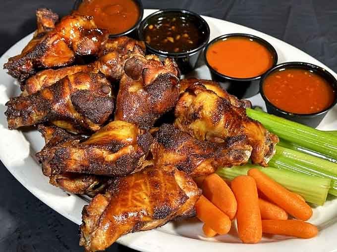 These smoked wings come with enough sauce options to make your taste buds do a happy dance.