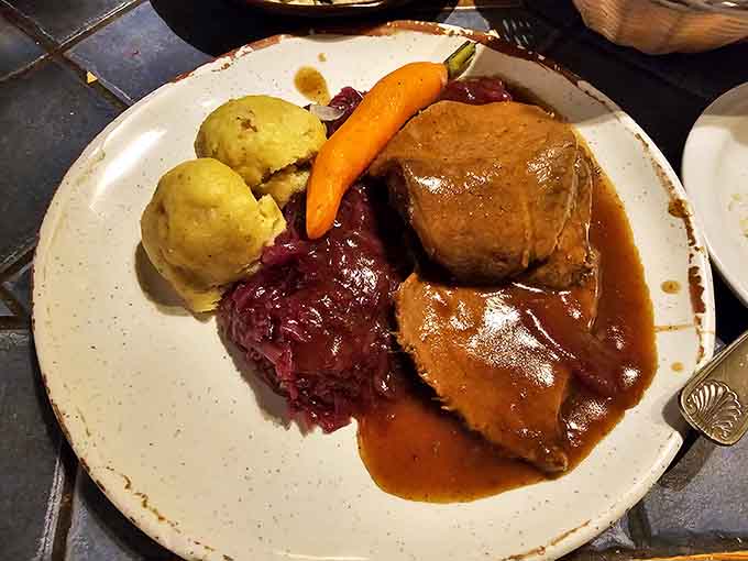 Sauerbraten with red cabbage and sp&auml;tzle, proving that slow-cooked beef in gravy is an international language of love.