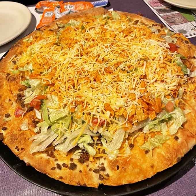 El Vampiro Taco Pizza proves that sometimes the wildest menu ideas turn out to be pure genius on a plate.