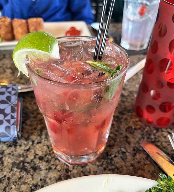 A Cape Cod mojito with fresh mint and lime, because even classic cocktails taste better with harbor breezes.