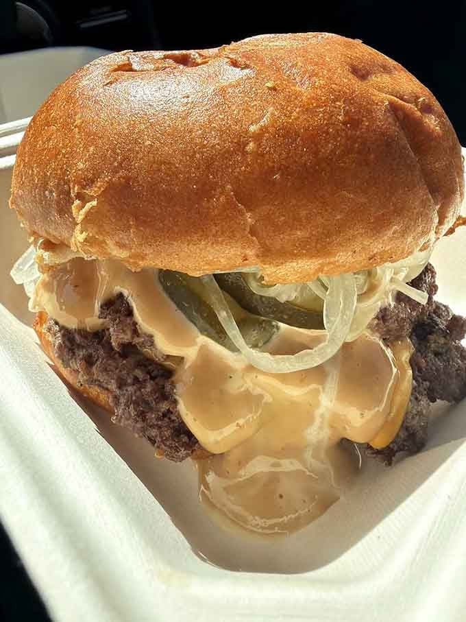 This burger's got more layers than your favorite mystery novel, and it's twice as satisfying to unravel.