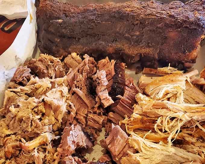 When you can't decide between ribs, brisket, and pulled pork, the sampler platter solves that delicious dilemma beautifully.