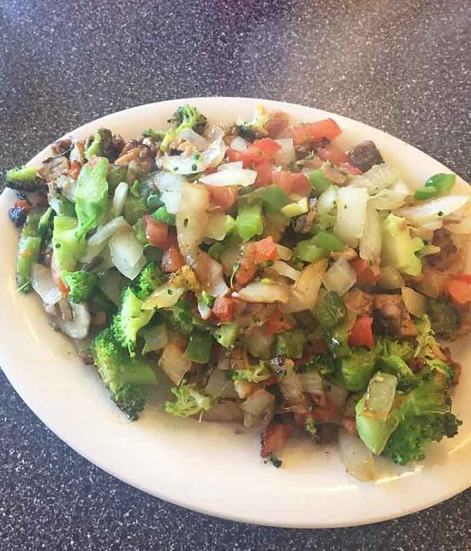 Behold the Hippie Hash: a colorful mountain of vegetables and feta that'll make you rethink everything about breakfast.
