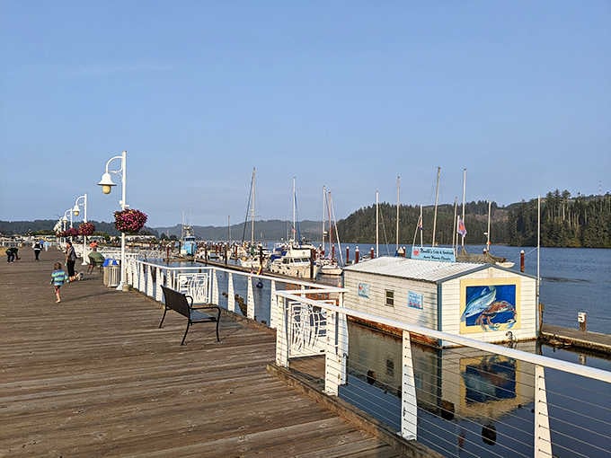 This boardwalk stretches along the marina where sailboats bob gently and seagulls provide the soundtrack to your morning coffee.