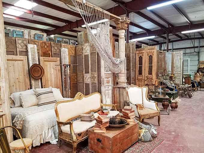 Vintage furniture and architectural salvage create a dreamy tableau that interior designers absolutely live for.
