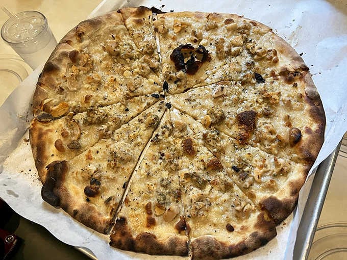 The legendary White Clam Pizza that launched a thousand debates about what belongs on pizza and changed minds forever.