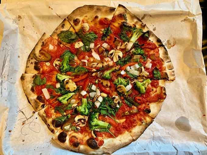 A vegetable-topped masterpiece that proves healthy eating doesn't have to mean sacrificing flavor or that perfect charred crust.