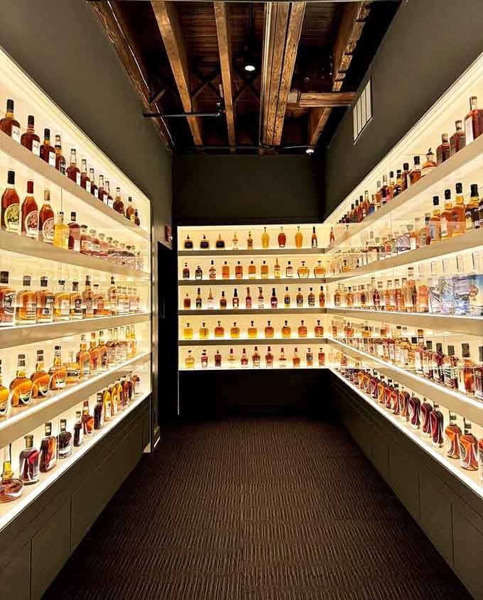 This glowing bourbon corridor looks like heaven's liquor cabinet, showcasing Kentucky's liquid gold in all its amber glory.