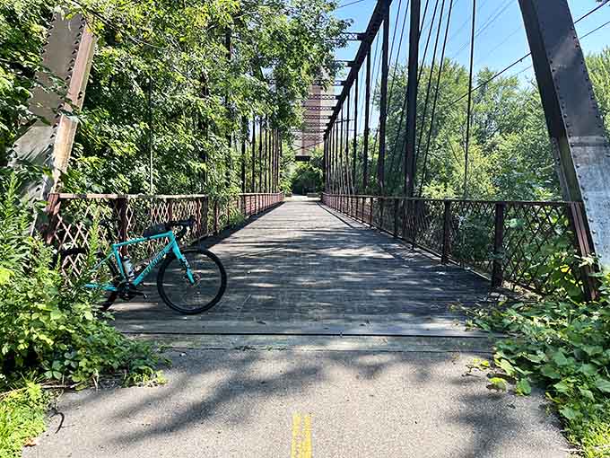 This trail bridge invites leisurely bike rides where your biggest worry is which ice cream flavor to choose later.