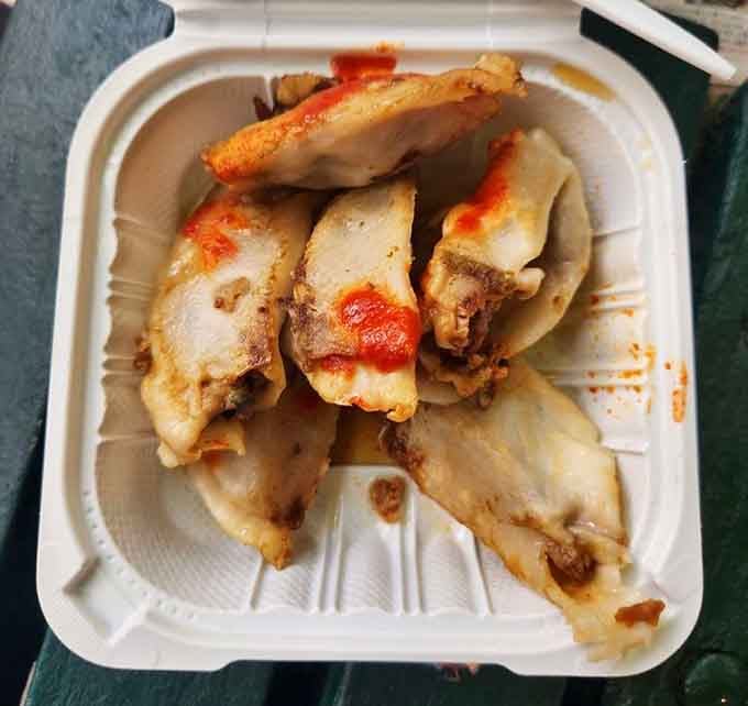 Golden, crispy, and glistening with promise, these dumplings are basically edible happiness in a takeout container.