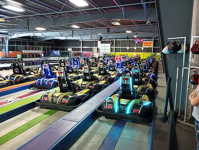 Go-karts lined up like colorful race cars at Daytona, except nobody's checking your driver's license here.